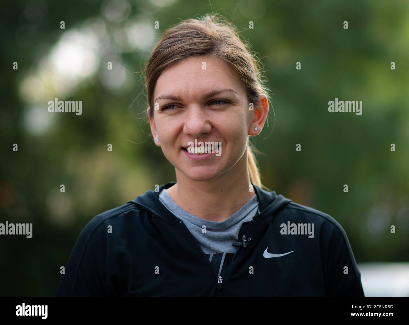Simona Halep of Romania talks to the media during All Access Hour at ...