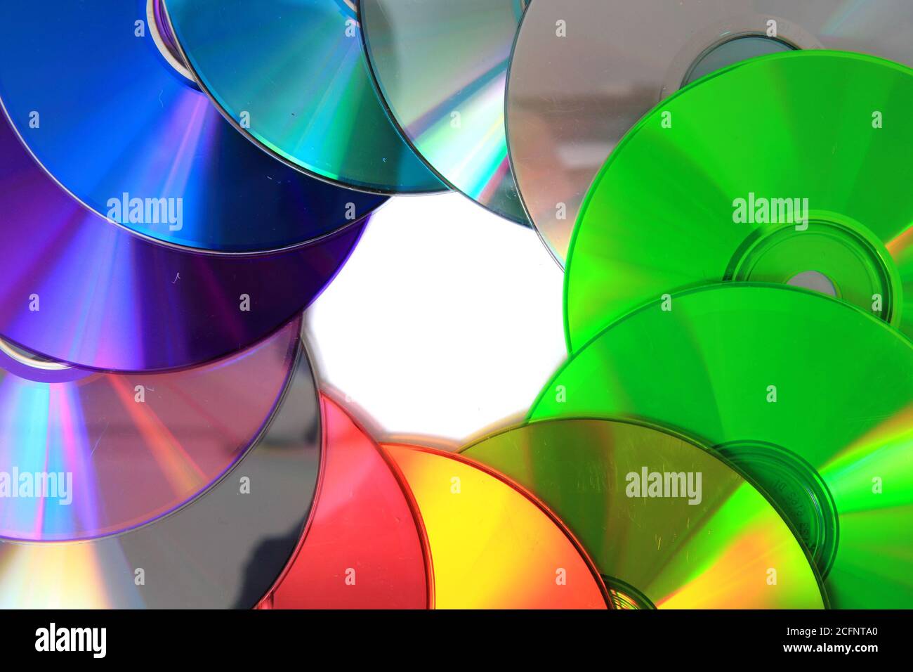 color CD and DVD isolated ond white background Stock Photo - Alamy