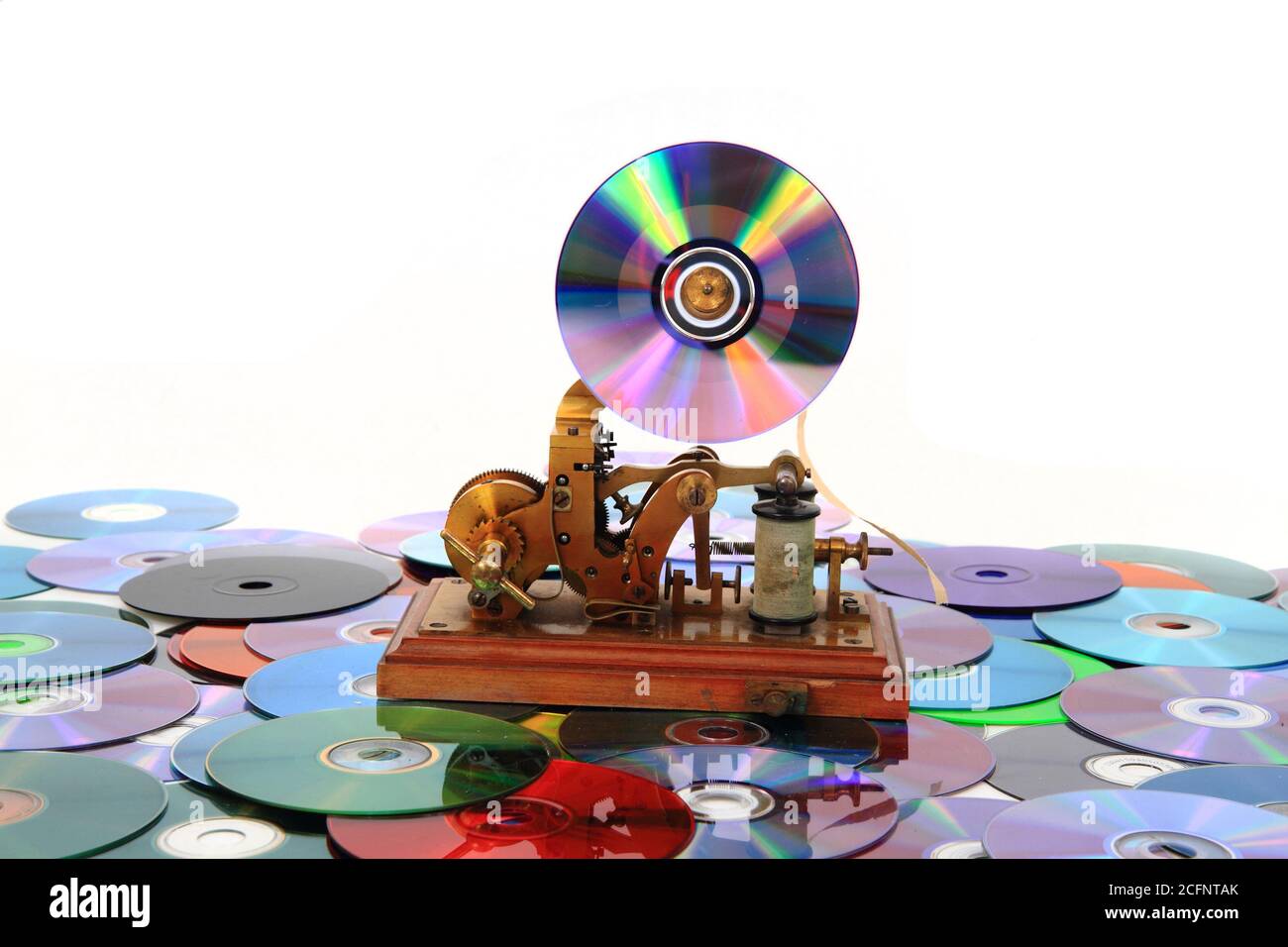 old telegraph and DVD and music CD isolated on the white background ...