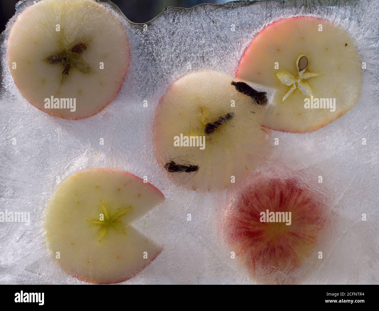 Background fresh season apple in ice cube with air bubbles Stock Photo ...
