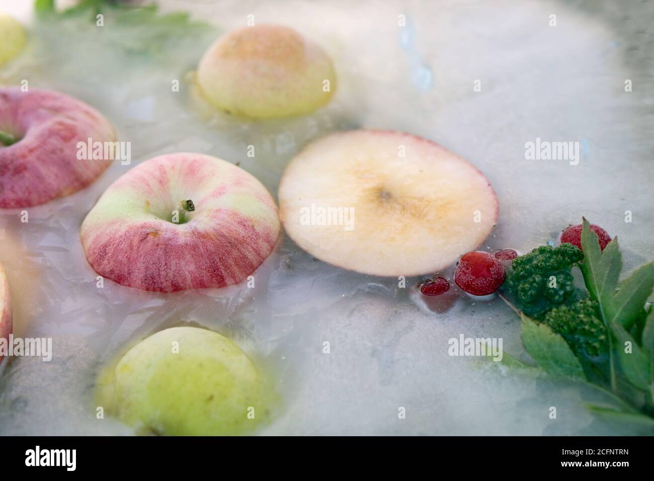 Background fresh season apple in ice cube with air bubbles Stock Photo ...