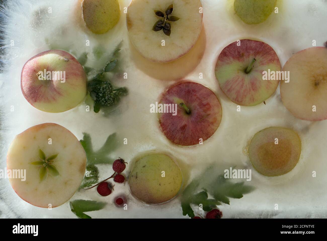 Background fresh season apple in ice cube with air bubbles Stock Photo ...