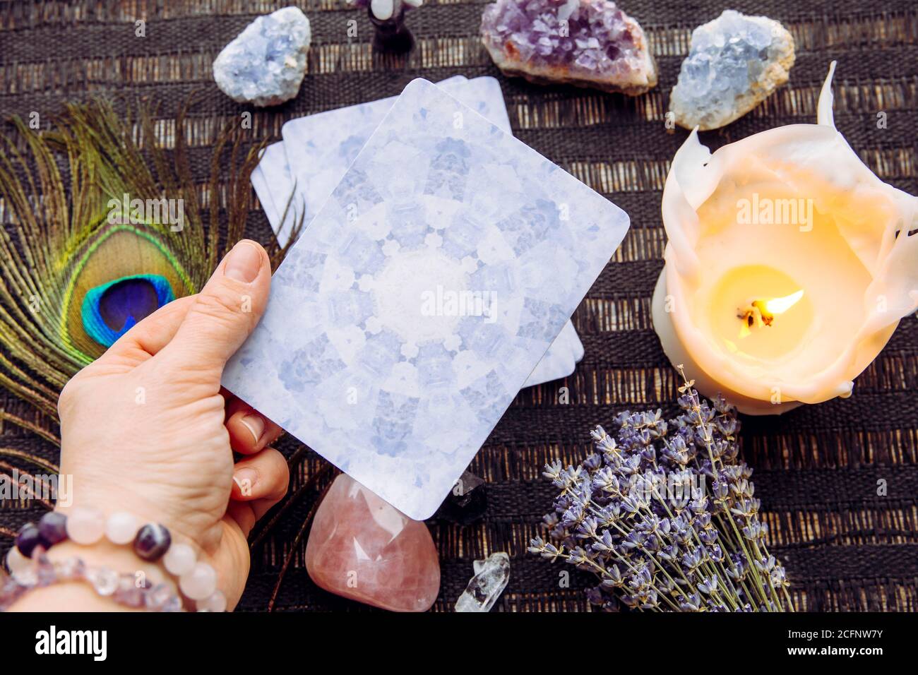 Angel holding cards hi-res stock photography and images - Alamy