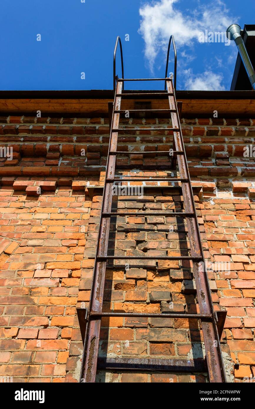 Brick wall and metal ladder hi-res stock photography and images - Alamy