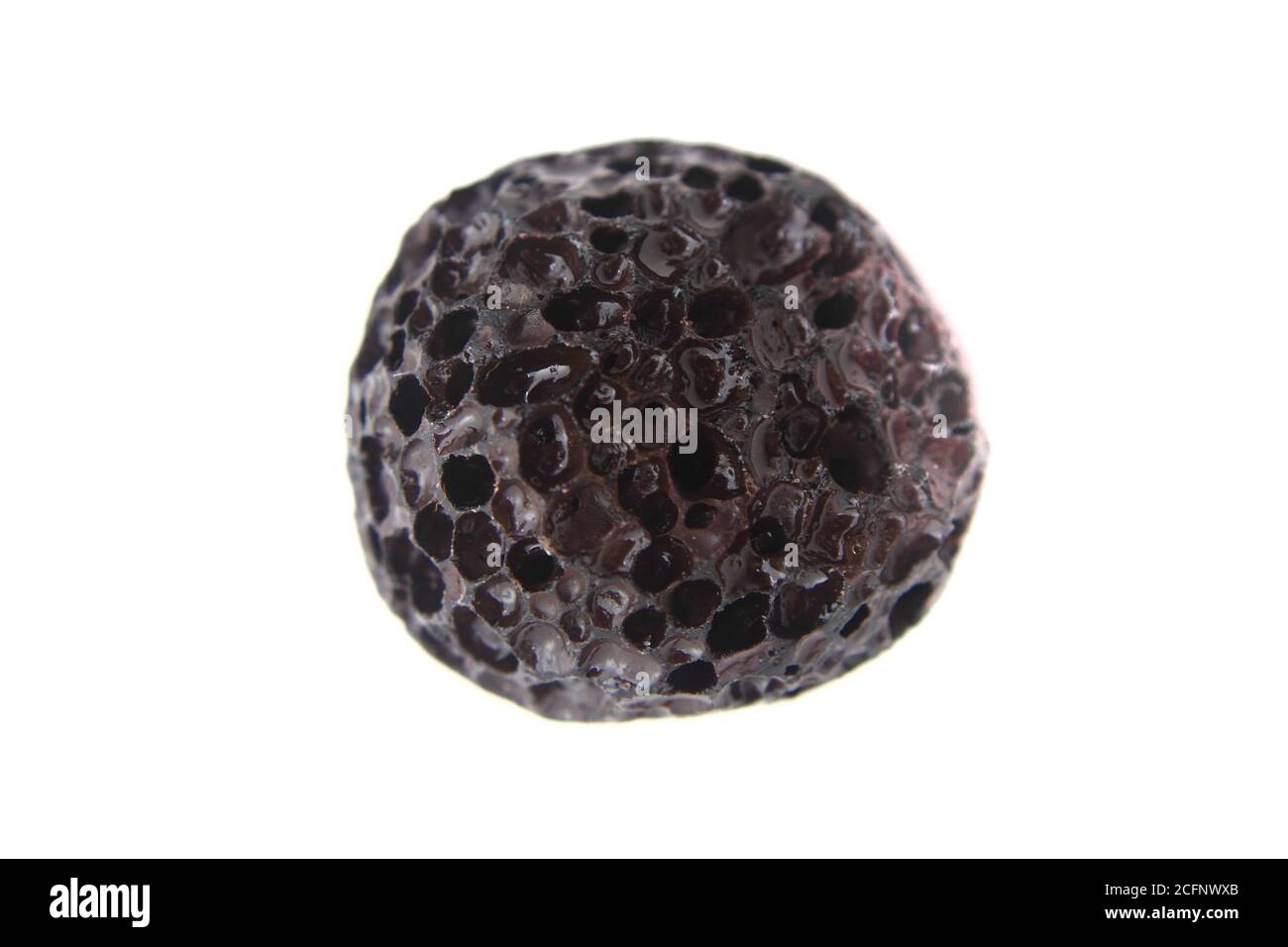 small black magma mineral (look like meteorite) isolated on the white ...