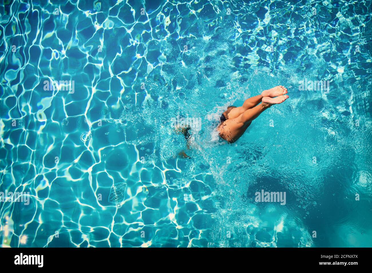 Woman diving in luxury swimming hi-res stock photography and images - Alamy