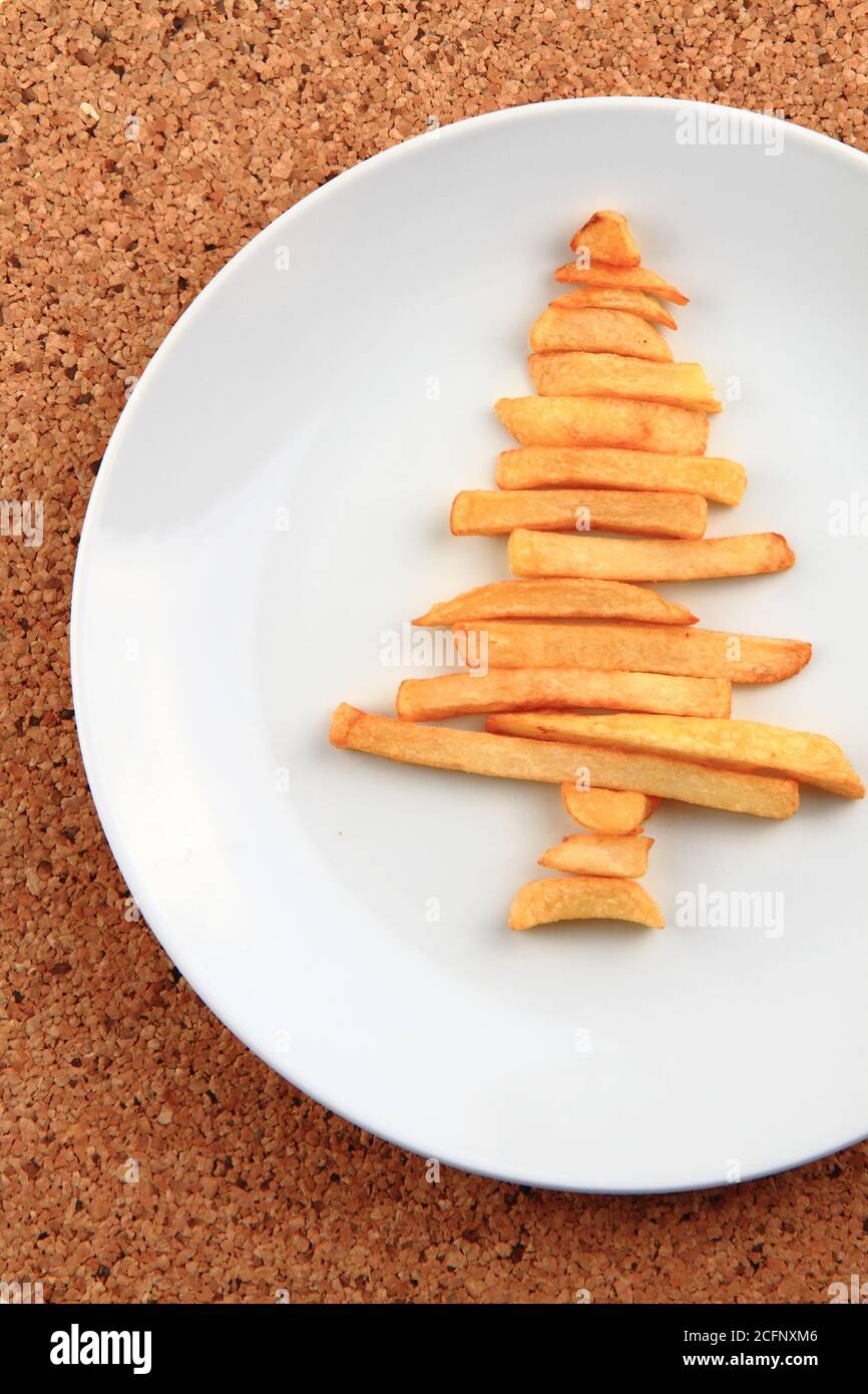 christmas tree from the potatoes chips as holiday background Stock ...