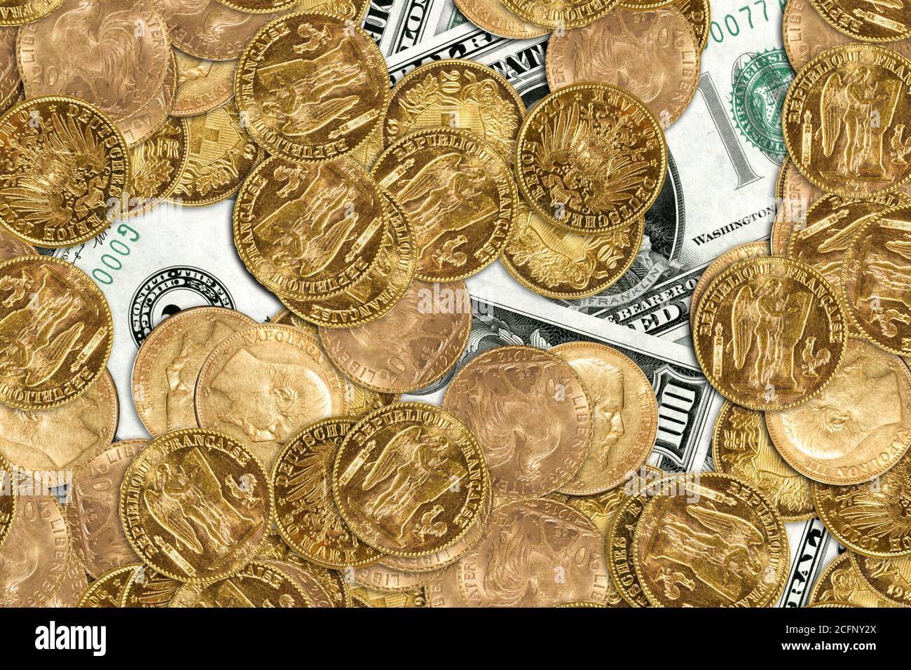 Lots of gold coins and 100 USD bank notes Stock Photo - Alamy