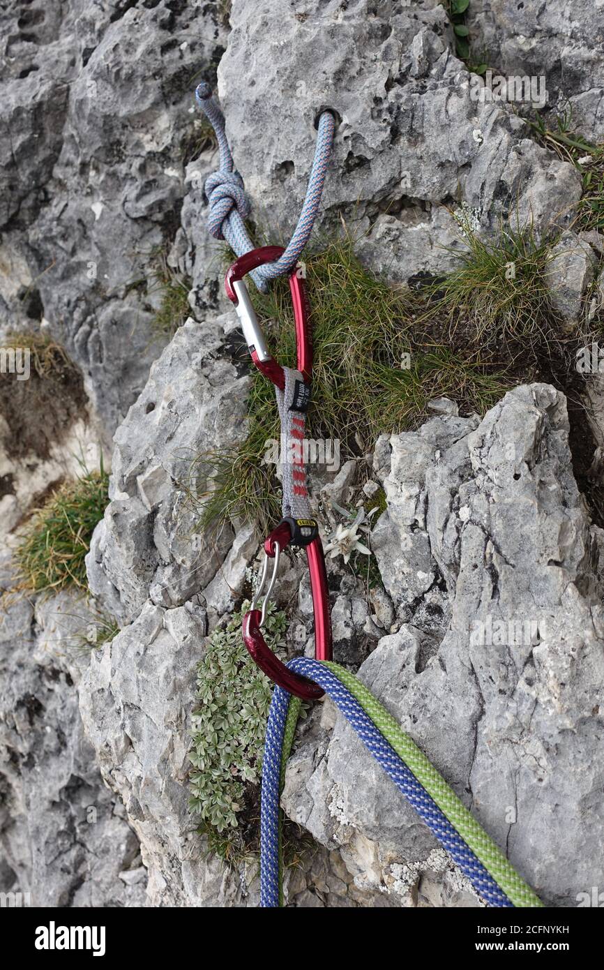 placing mobile rock climbing protection on a natural and obvious rock ...