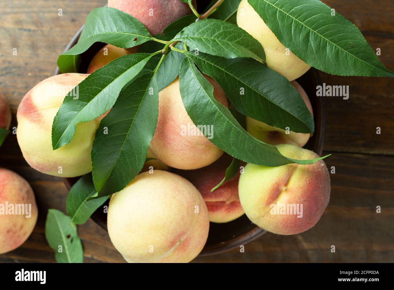 fresh rosy peaches in a basket, top view. summer fruit harvest Stock ...