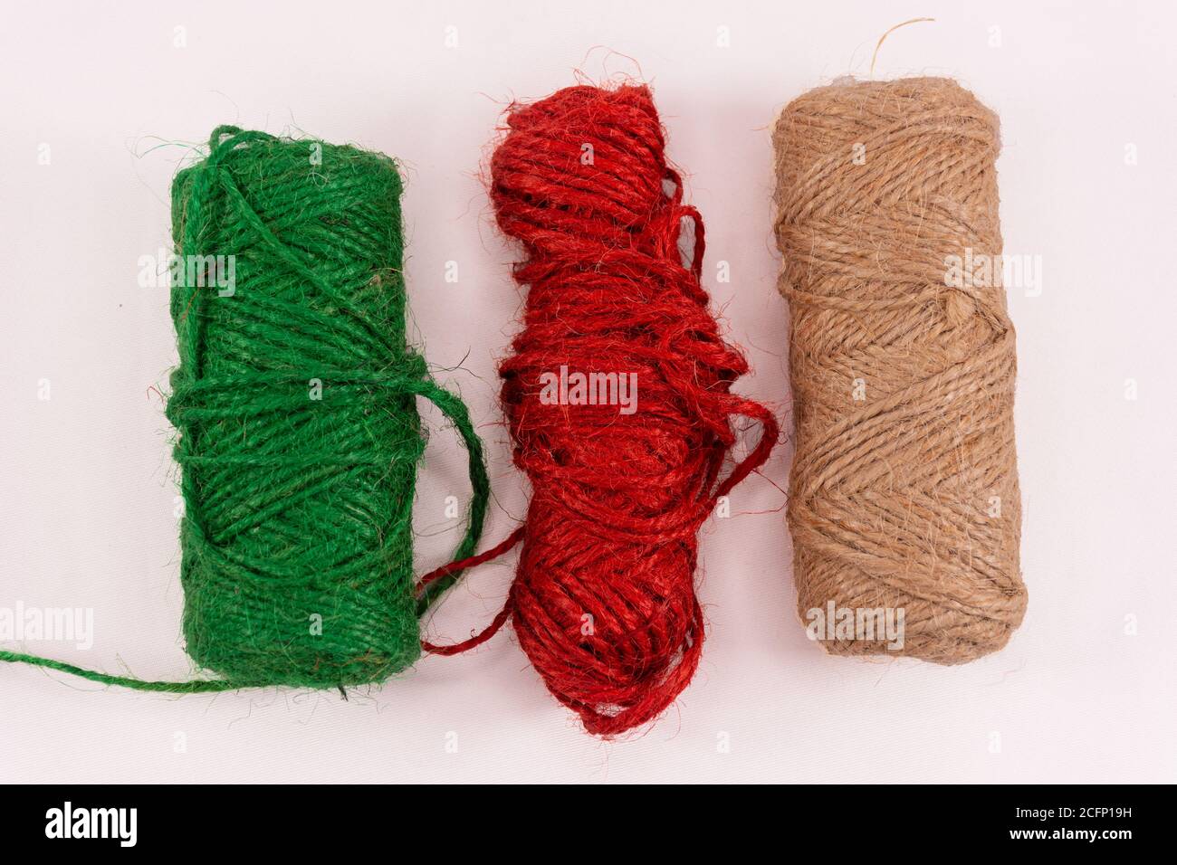 Close up of balls of colorful hemp twine Stock Photo - Alamy