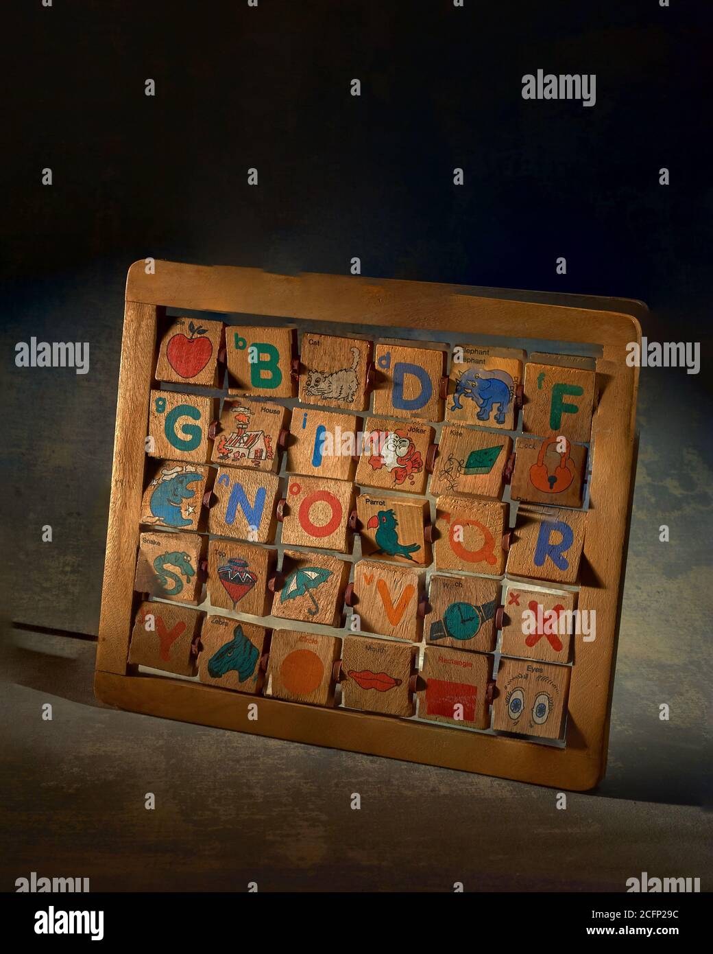 Educational toy made of wooden english alphabets arranged from A-Z with ...