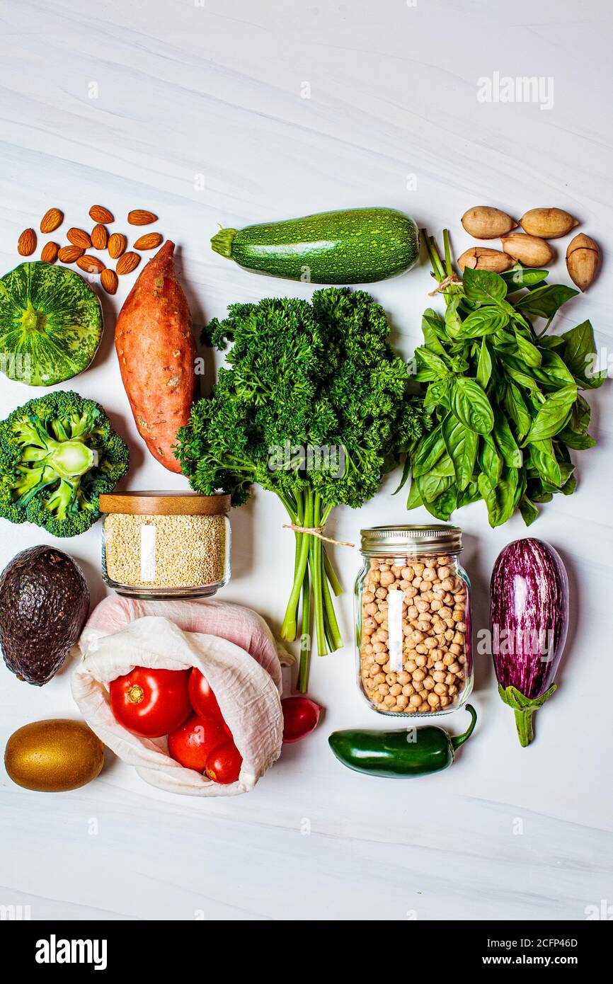 Healthy food flat lay. Fresh vegetables, fruits, nuts, quinoa ...