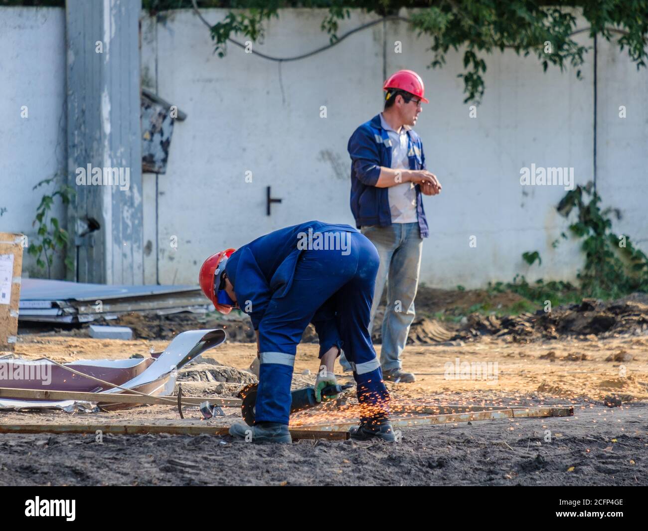 Moscow. Russia. 06 September 2020 Workers in blue uniforms and red ...