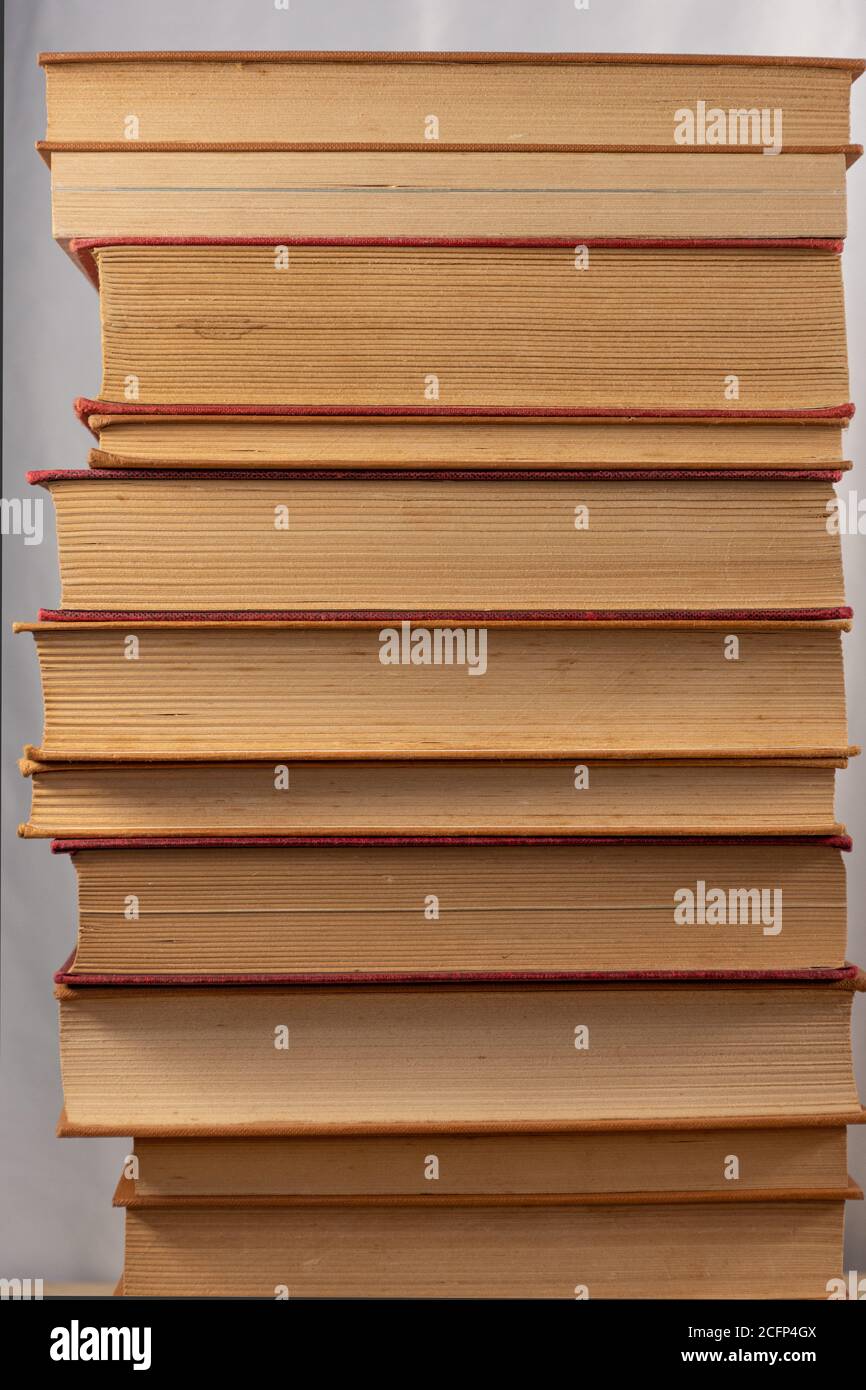 Background with piled up old books Stock Photo - Alamy