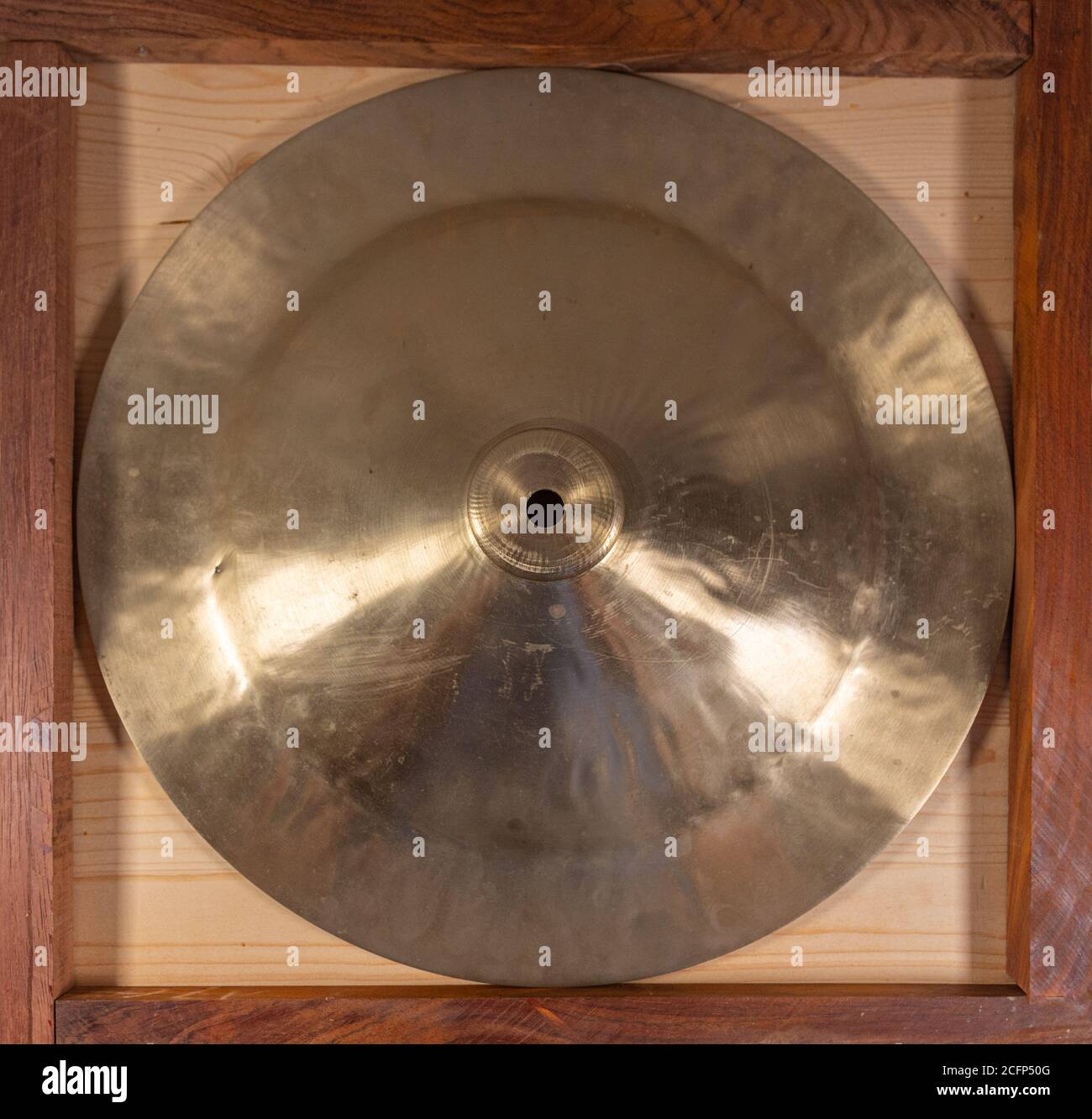 Close up of a bronze musical cymbal. Concept of metal processing Stock ...