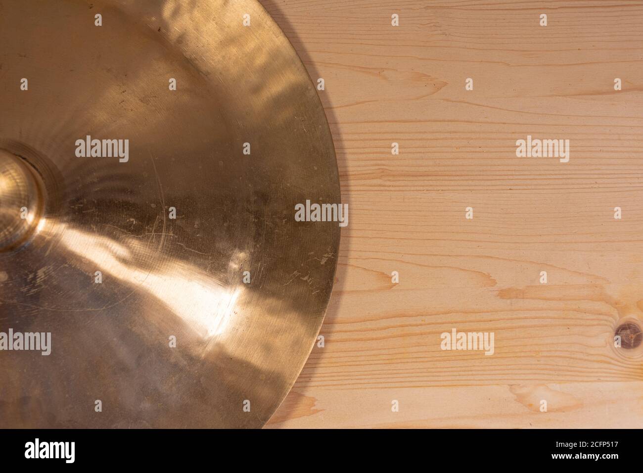 Close up of a bronze musical cymbal. Concept of metal processing Stock ...