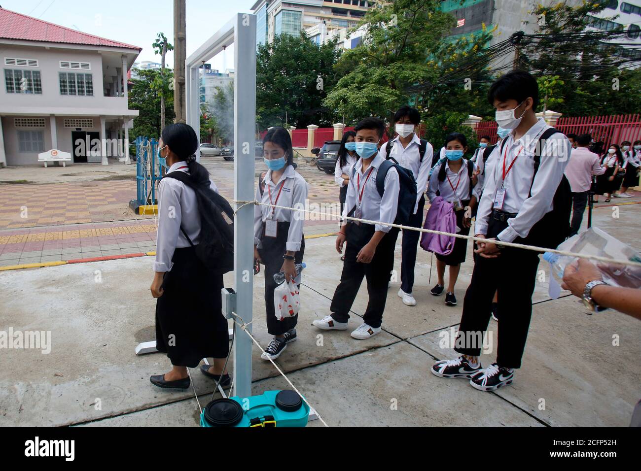 Phnom Penh, Cambodia. 7th Sep, 2020. Students walk through a ...