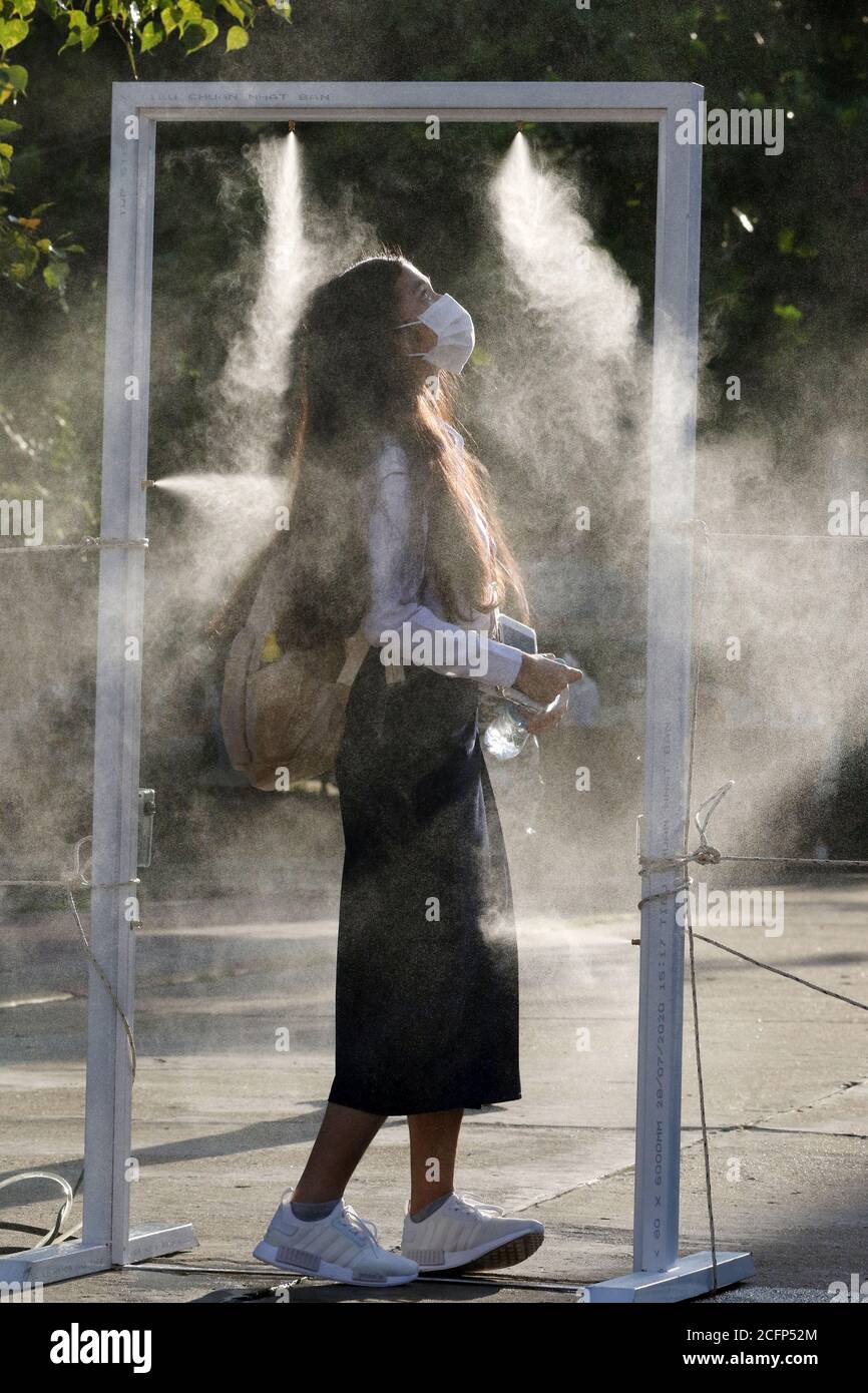 Phnom Penh, Cambodia. 7th Sep, 2020. A student walks through a ...