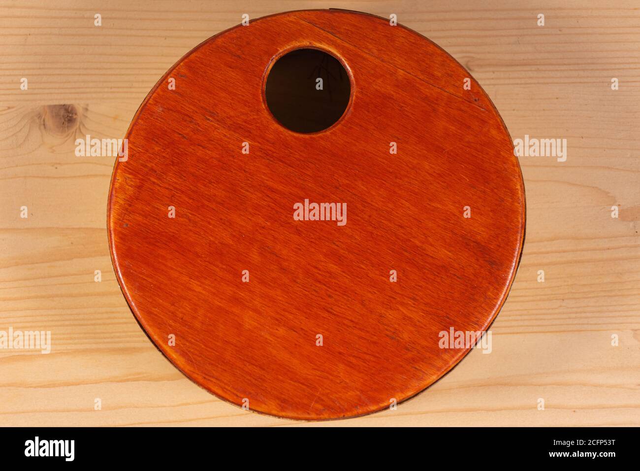 Close-up of a small round wooden drum Stock Photo - Alamy