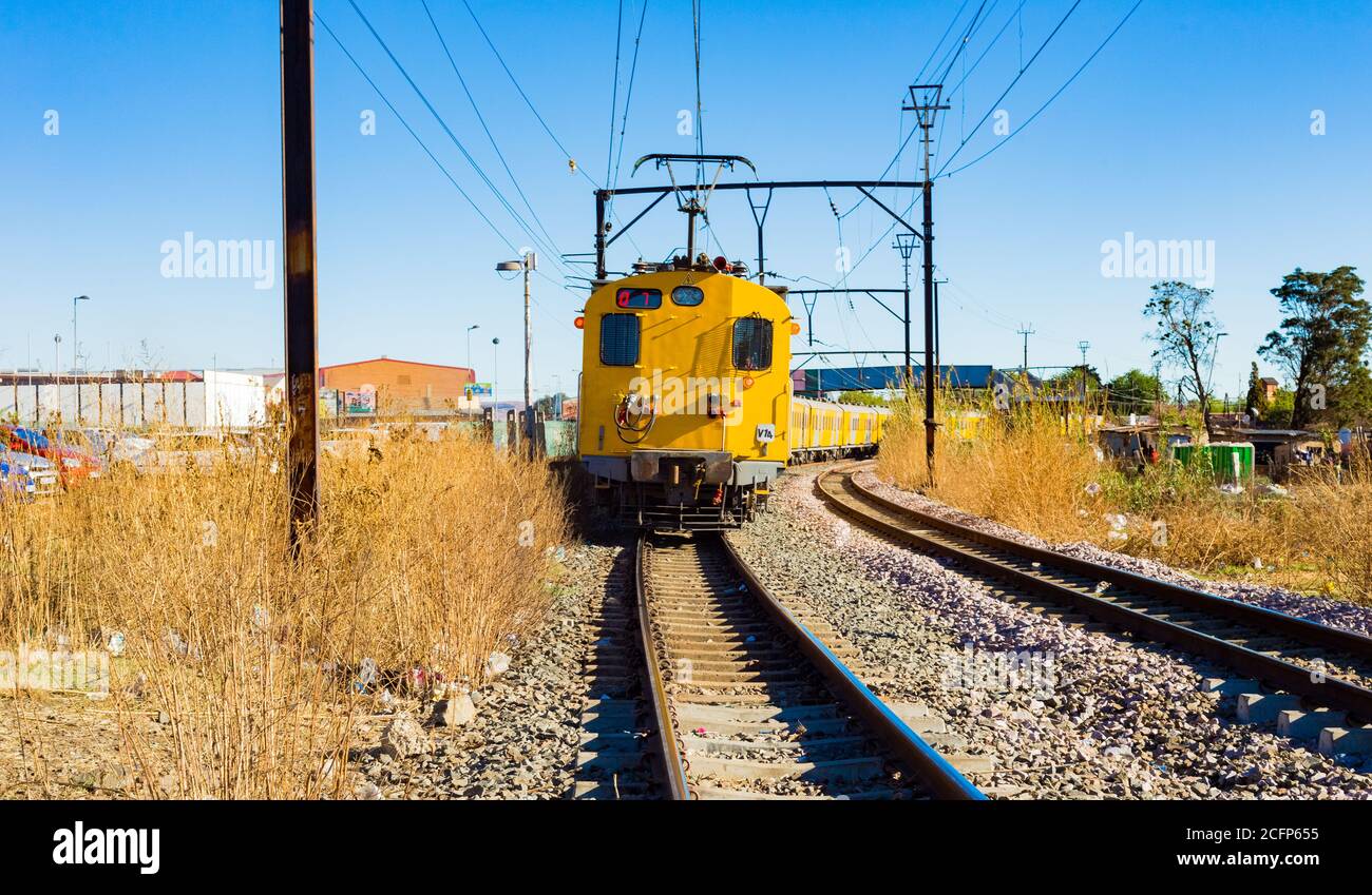Soweto, South Africa - September 08 2018: Commuter Train moving through ...