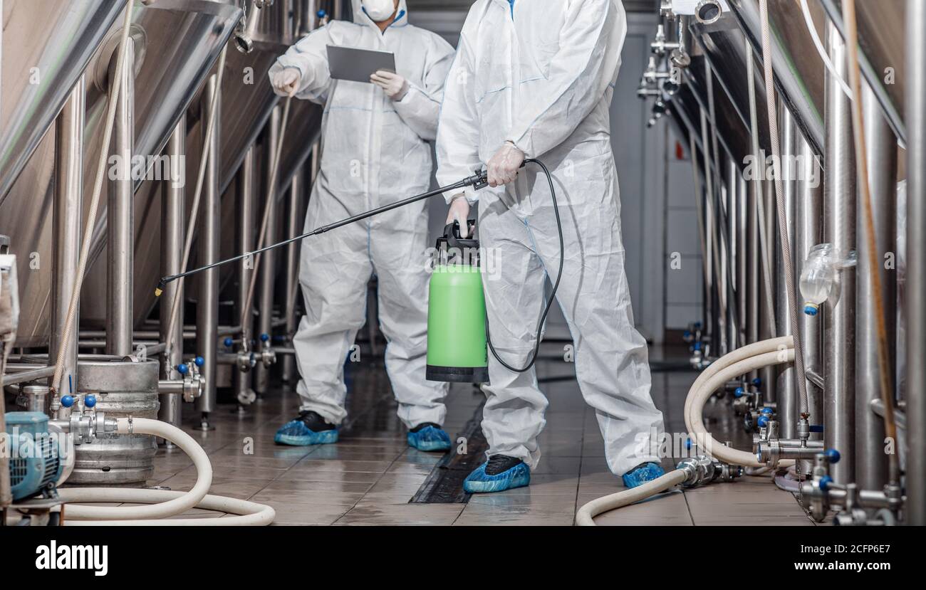 Factory suits hi-res stock photography and images - Alamy