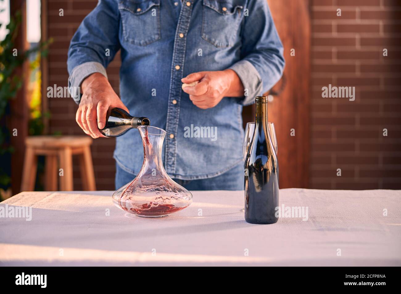 Preparing the beverage for wine testing event Stock Photo - Alamy
