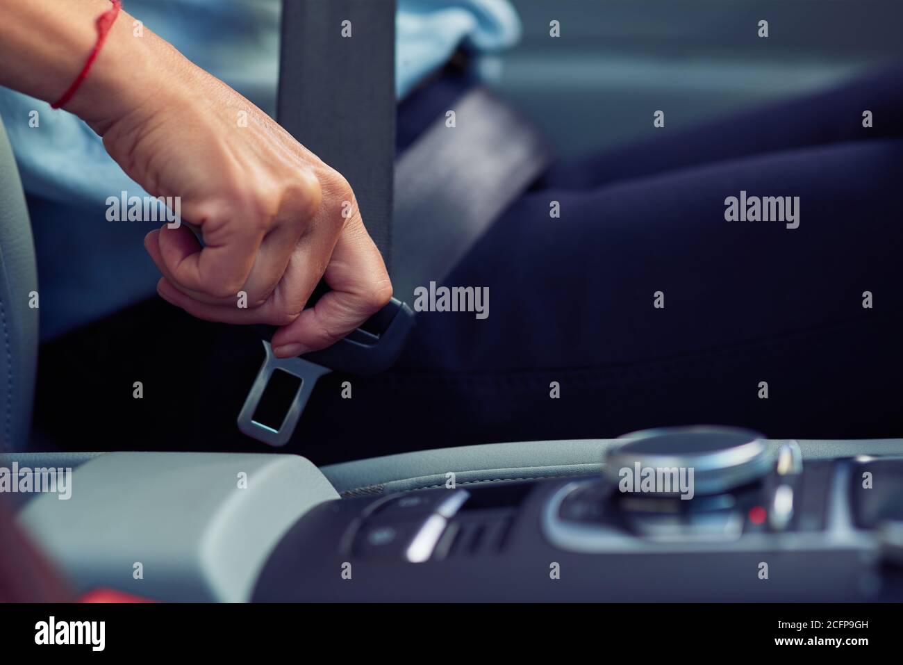 Safety. Cropped shot of a woman sitting behind steering wheel of her ...