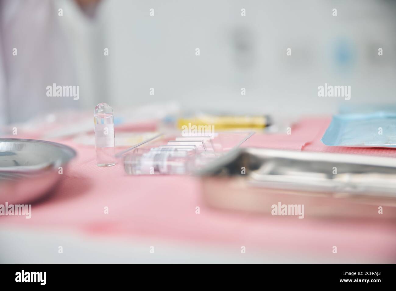 Pharmaceuticals and stainless steel trays used for a medical procedure ...