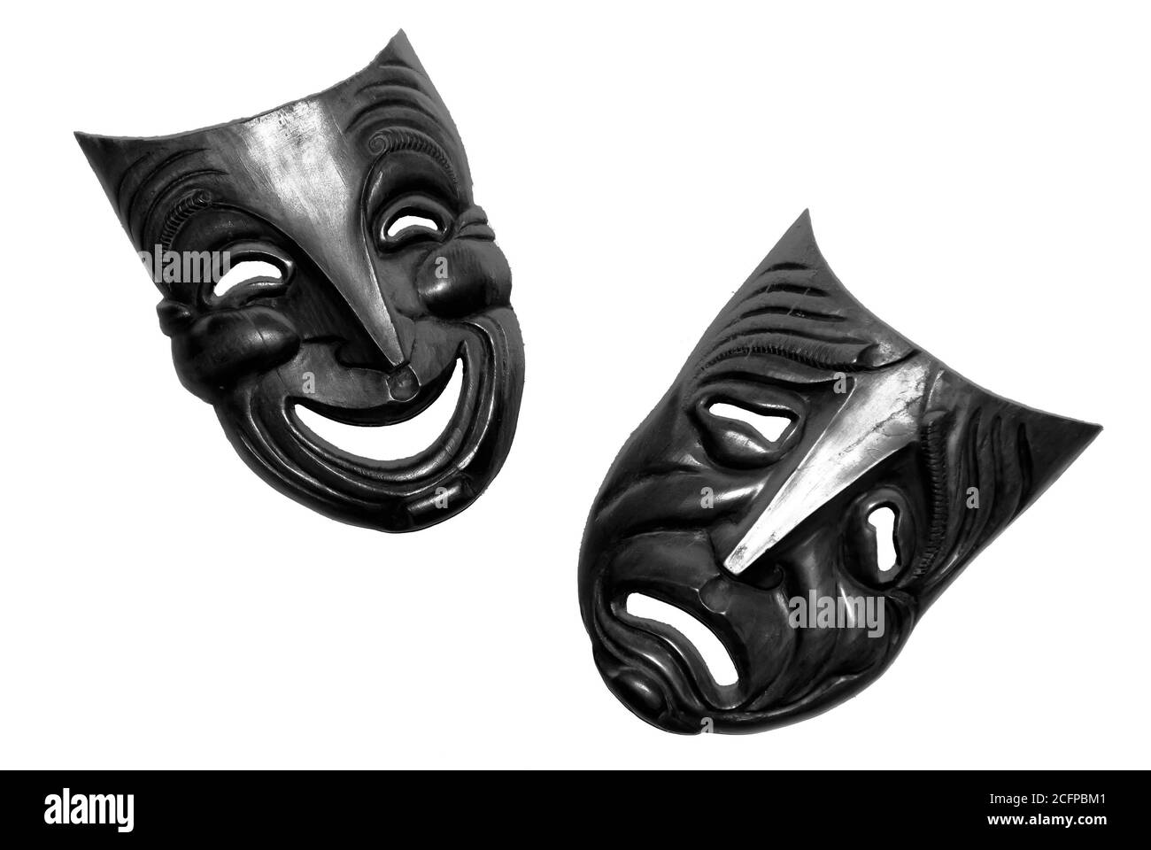 Closeup shot of happy and sad face masks isolated on white background ...