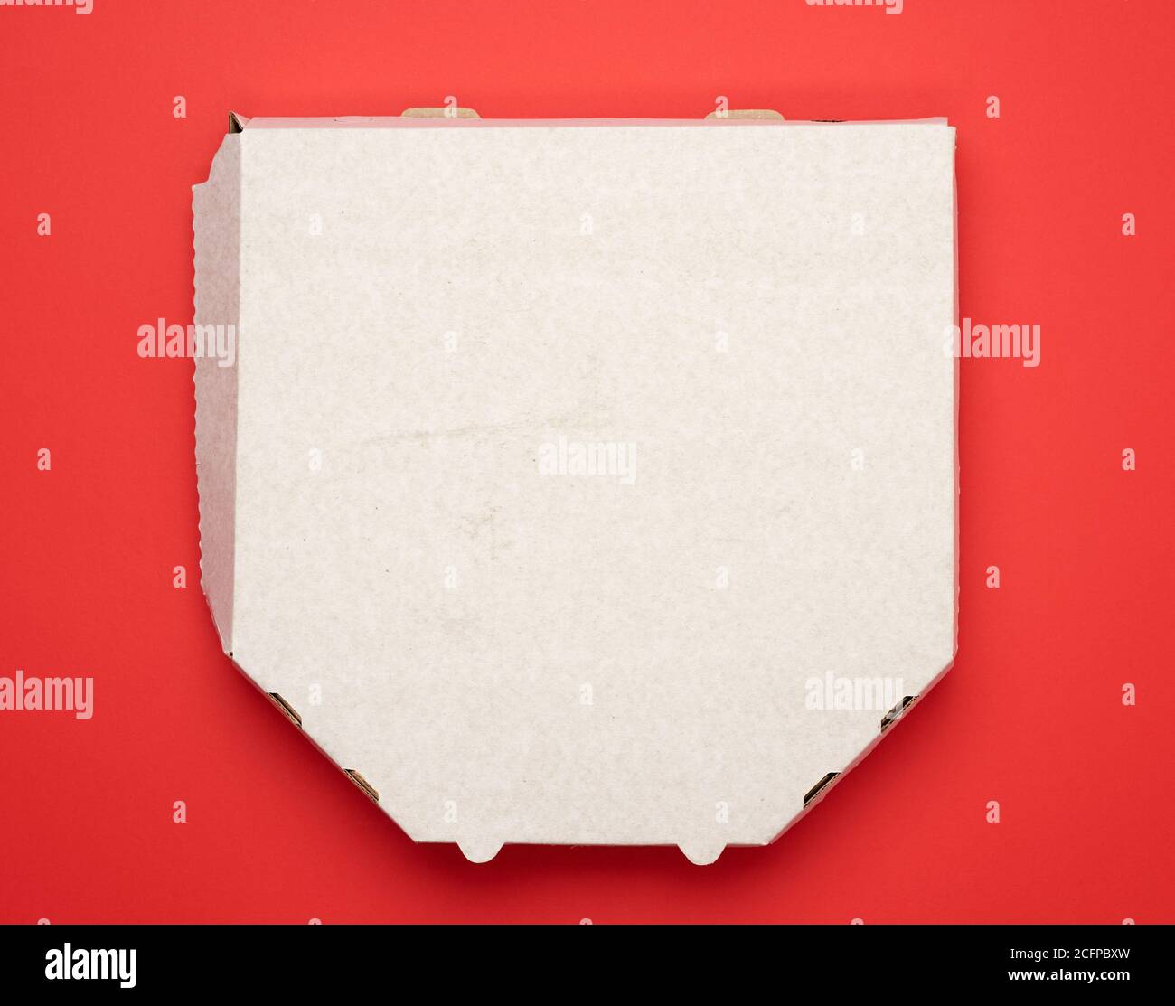 square cardboard white pizza box on red background, top view Stock ...