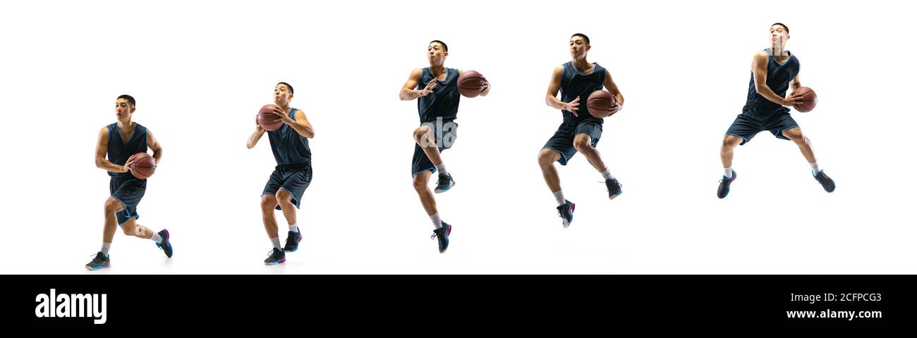 High flight. Young basketball player of team training in action, motion ...