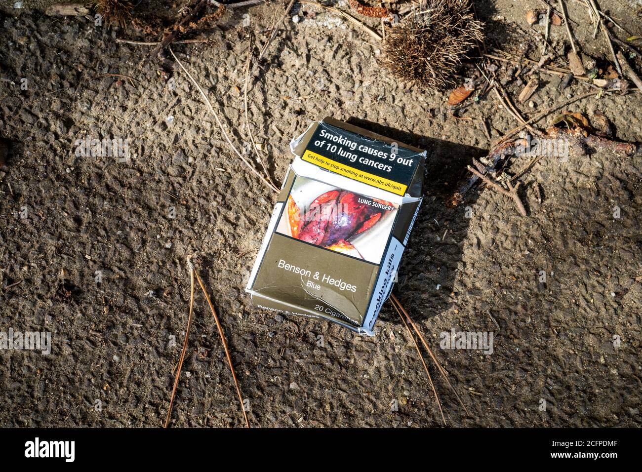 Benson & Hedges empty cigarette packet Stock Photo - Alamy
