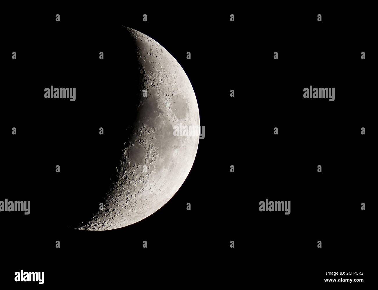 View of crescent Moon with telescope Stock Photo - Alamy
