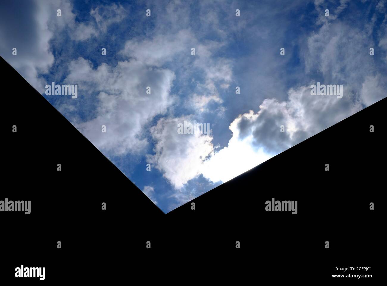 cloudy blue sky and black linear space Stock Photo - Alamy