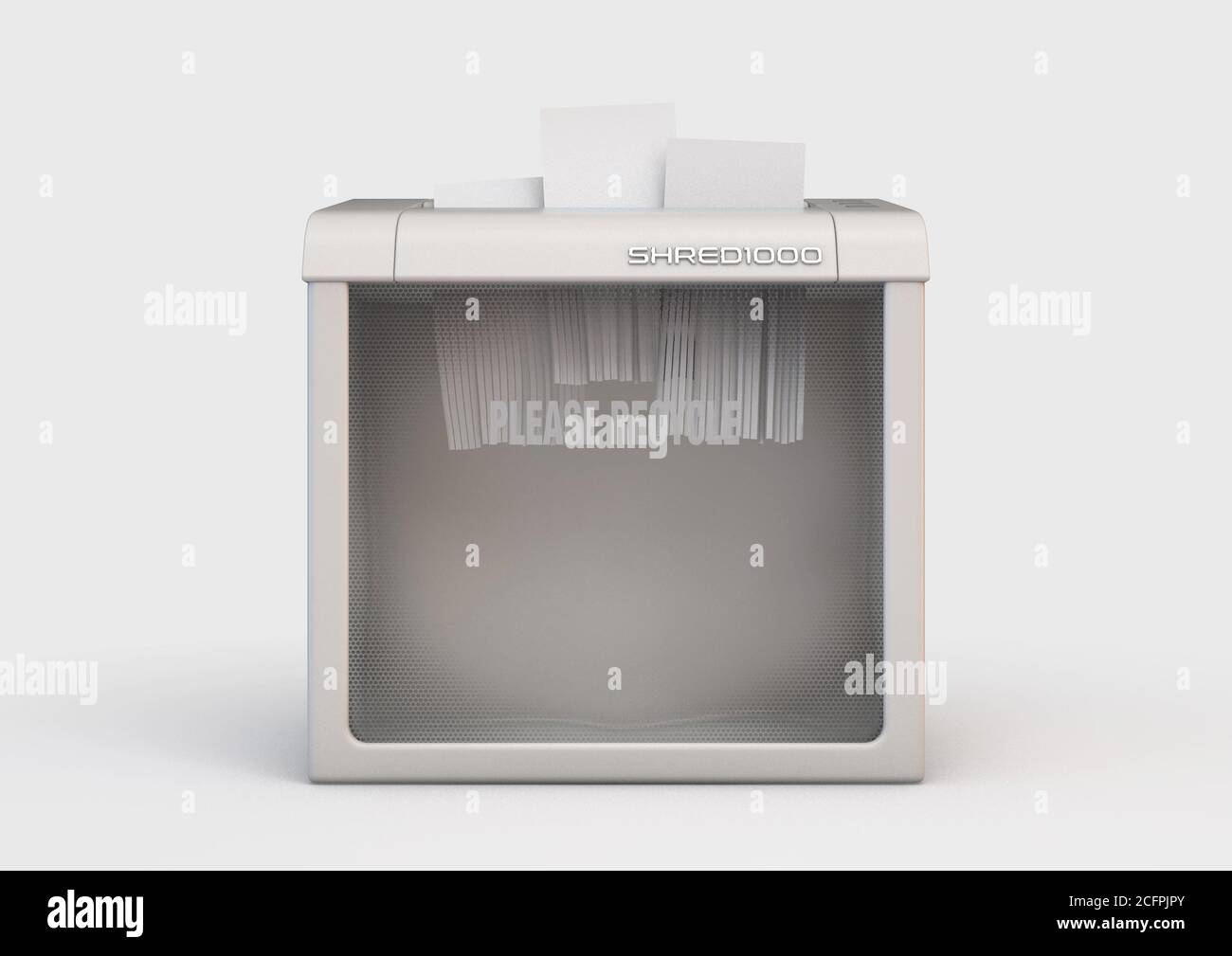 A regular office paper shredder in the process of shredding paper on an ...