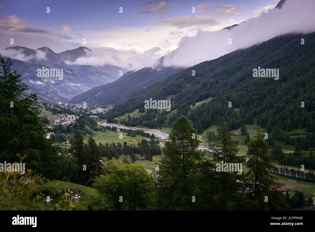 Clouds and wonderful lights in the Italian Alps Stock Photo - Alamy