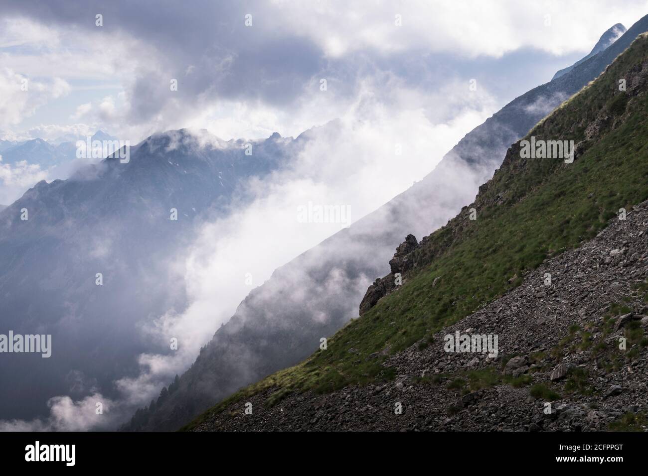 Clouds and wonderful lights in the Italian Alps Stock Photo - Alamy