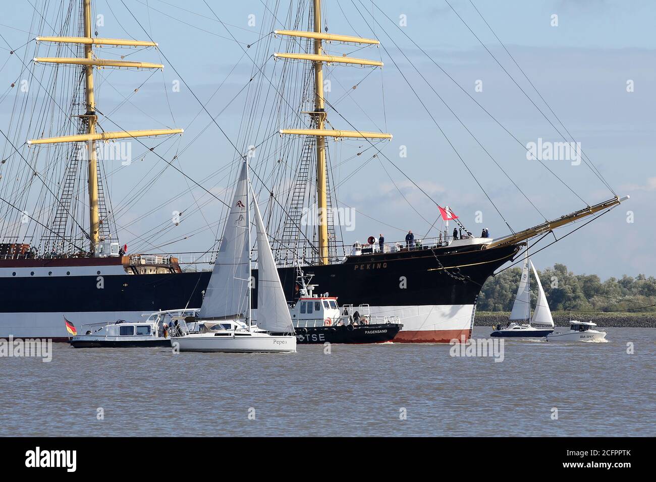Twielenfleth, Germany. 07th Sep, 2020. Pulled by tugboats, the four ...