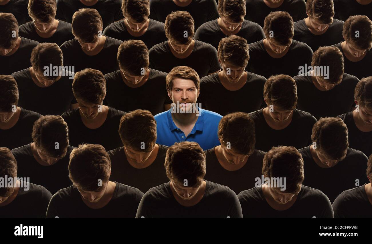 Top view of grey crowd of identical people and special one man ...