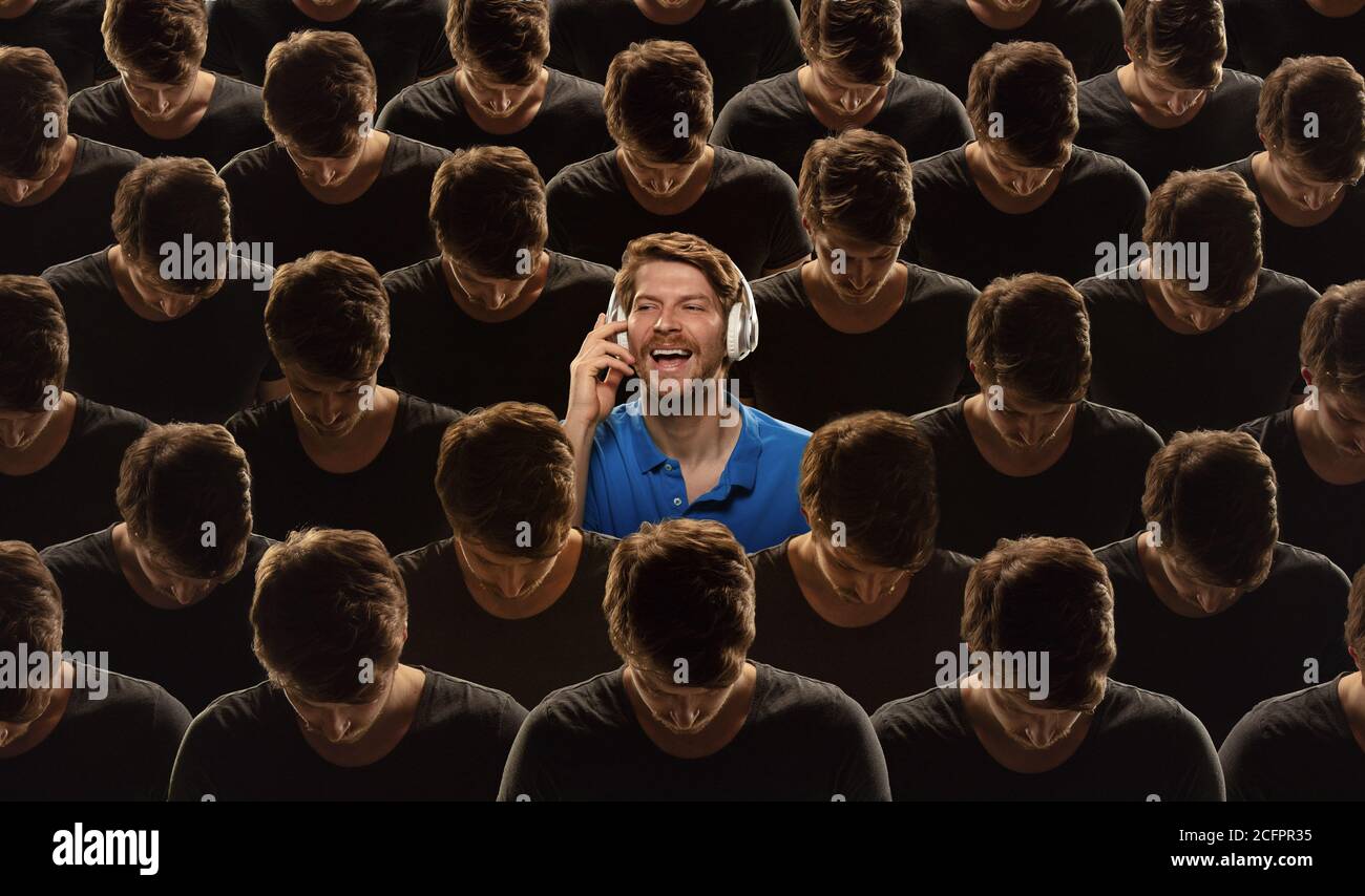 Top view of grey crowd of identical people and special one man ...