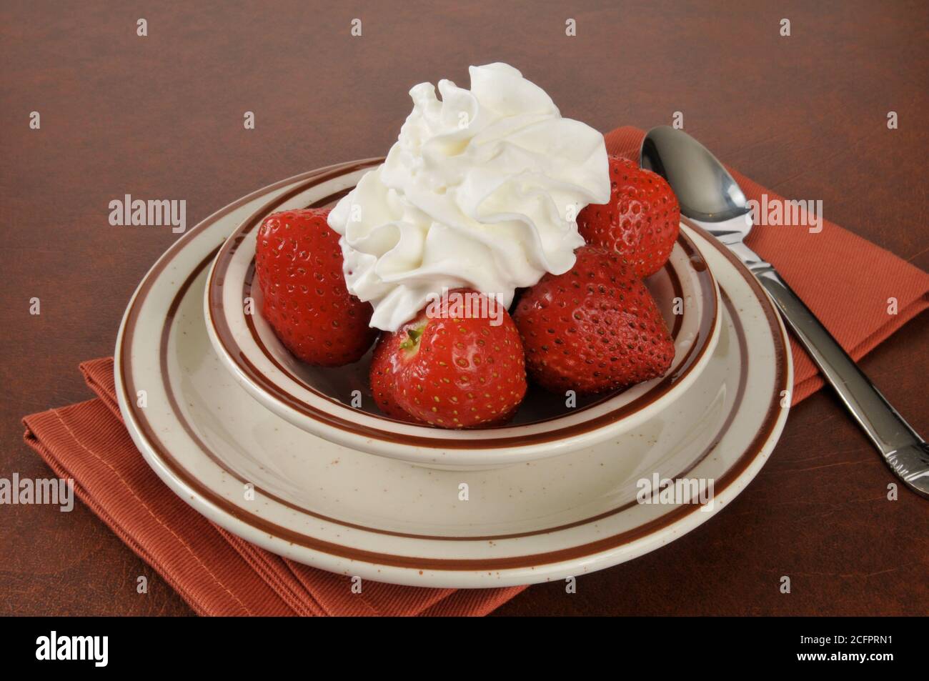 Fresh ripe strawberries with whipped cream Stock Photo - Alamy