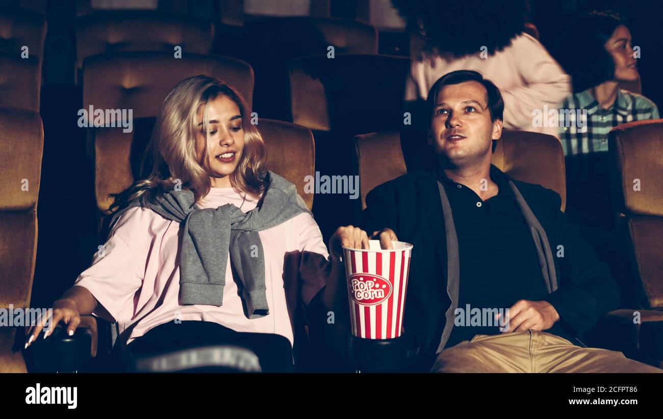 Walking to seats movie theater hi-res stock photography and images - Alamy