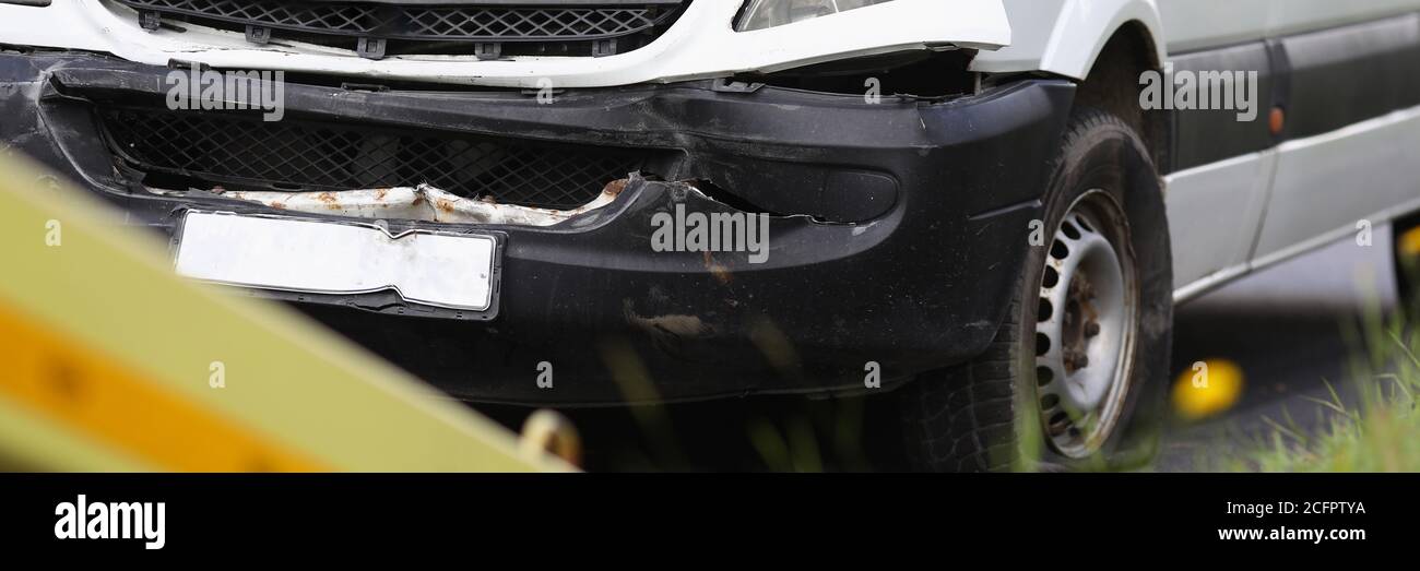 Broken minibus stands on road after an acciden Stock Photo - Alamy