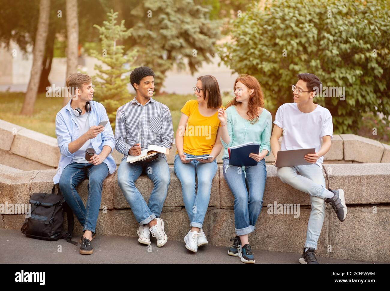 Diverse high school students studying hi-res stock photography and ...