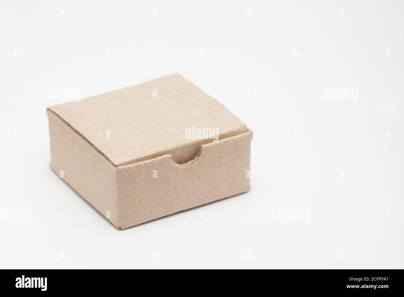 closed carton box on white background with selective focus Stock Photo ...