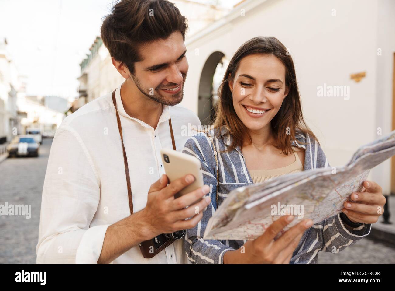 Couple deciding trip hi-res stock photography and images - Alamy