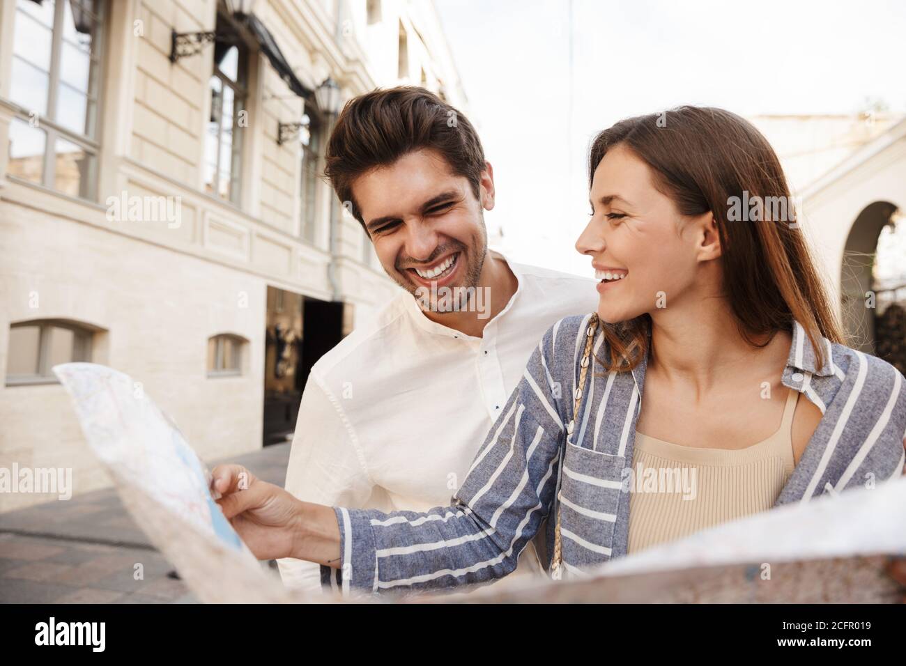 Couple deciding trip hi-res stock photography and images - Alamy