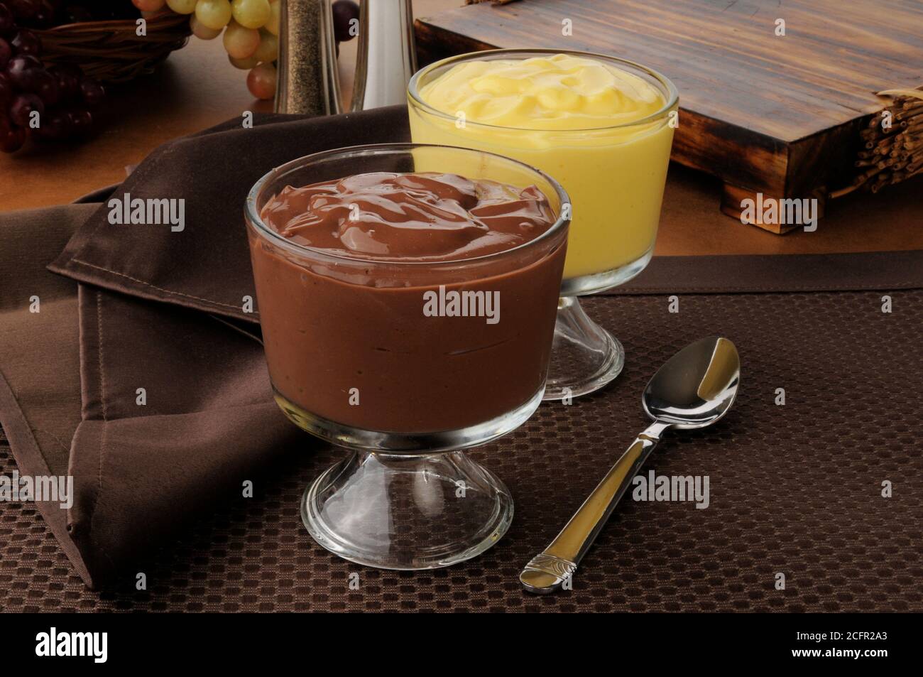 Cups of chocolate and vanilla pudding Stock Photo - Alamy