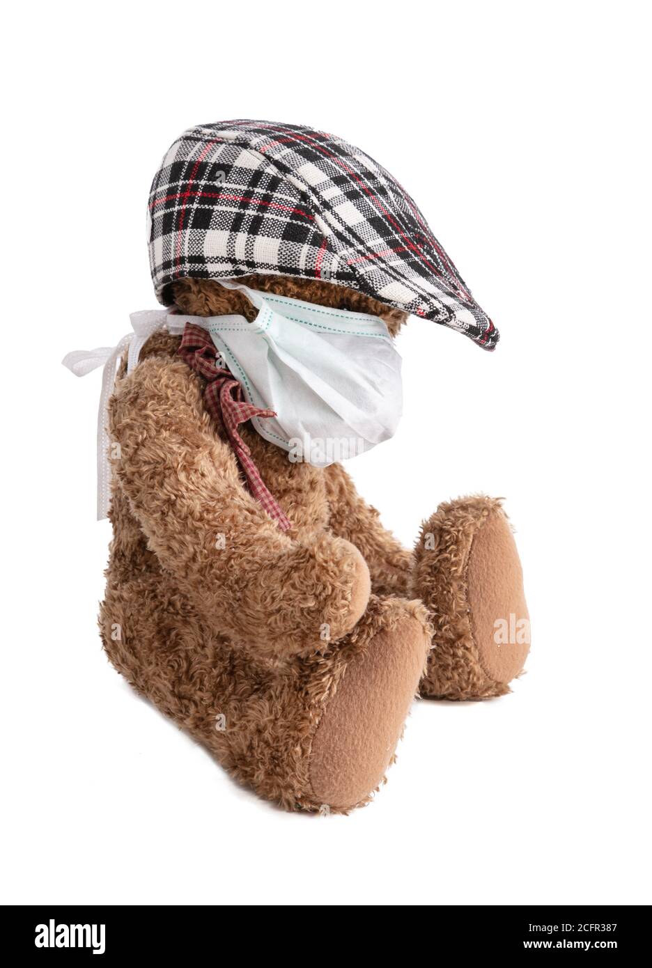 teddy bear with a protective mask on a white background Stock Photo - Alamy